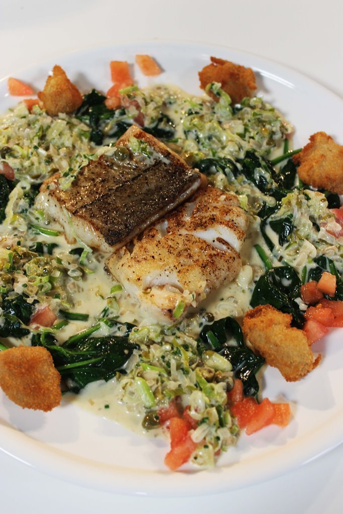 Recept "Schelvis met spinazie en witte chocoladesaus" | njam!